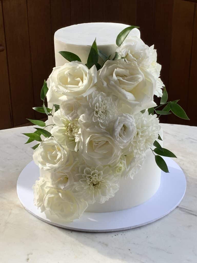 White Floral Cascade Cake - Alyssa’s Kitchen | Custom Made Cakes & Desserts